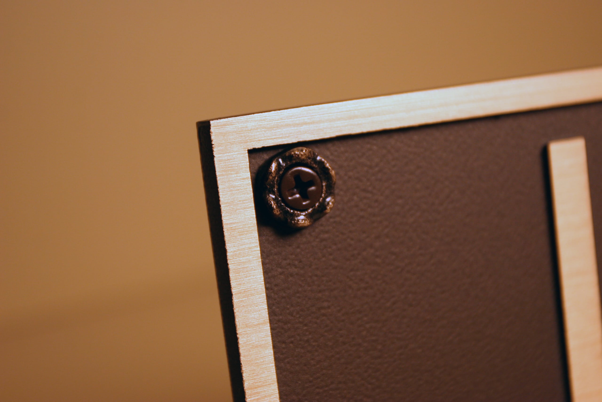 How to Install a Heavy Plaque Without Wall Damage - Impact Signs